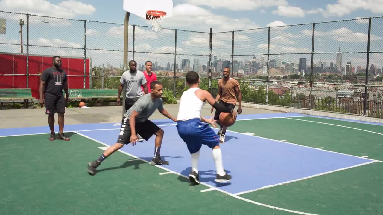 People Playing Basketball Outside